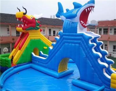 China 14*18m Inflatable Water Park with 1200w Blower and 1-20 People Capacity Dragon Shark Slide and Large Swimming Pool for sale
