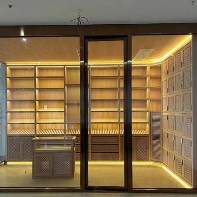 China The source factory's Spanish cedar wood cigar room is designed and decorated with constant temperature and humidity. It features a private custom-made solid wood cigar cabinet for sale