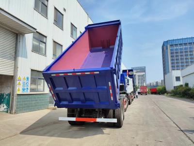 China 400HP Low Fuel Consumption HOWO Blue Tipper Dump Truck RHD 6×4 12wheels High Horsepower for sale