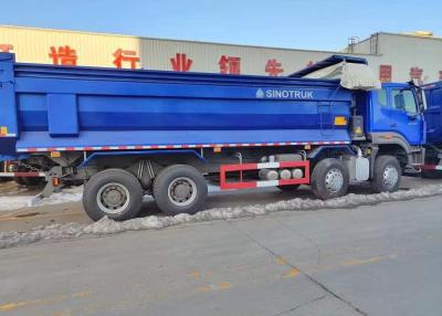 Cina RHD 8×4 12 ruote ZZ3317V3847B1R Alta potenza Basso consumo di carburante380HP Blu HOWO Tipper Truck in vendita