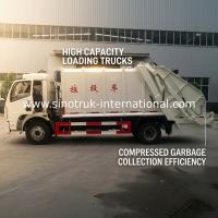 China SINOTRUK HOWO 5CBM Compressed Garbage Compactor Truck with 30T Rolling Force and 95km/h Speed for sale