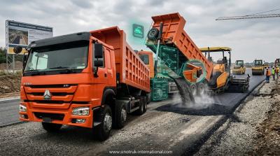 China Low Fuel Consumption Efficient Tipper Dump Truck 371HP 8x4 RHD SINOTRUK HOWO for sale
