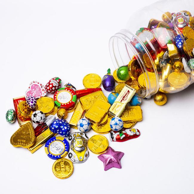 Close-up view of gold foil wrapped chocolate coins showing detailed coin pattern