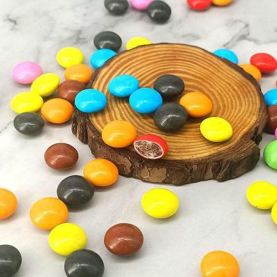 China Dark Brown Baking Ingredients Heat Resistant Chocolate Beans Not Easily Melted Drop De Chocolat for sale