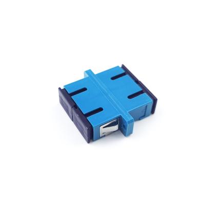 Cina FTTH SC Adapter in fibra ottica con materiale PBT UPC Eared Dustproof Duplex Coupler in vendita