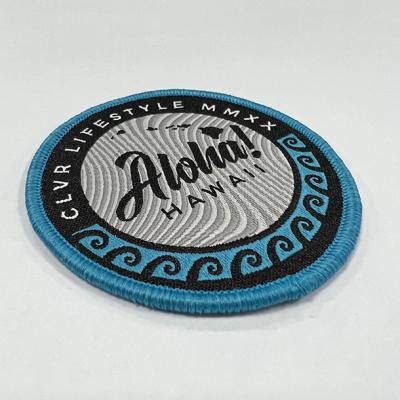 中国 注文のロゴのホックおよびループ裏付けパッチは手紙で刺繍した衣類のためのパッチを縫う 販売のため