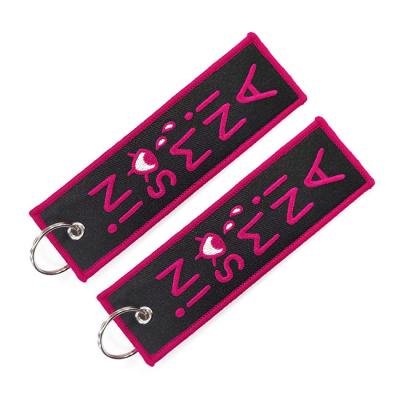 China La frontera de Overlock bordó los llaveros Jet Tag Keychains promocional en venta