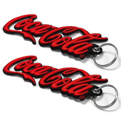 Cina OEM Logo Keychain su ordinazione, etichetta a catena chiave ricamata del regalo di promozione in vendita