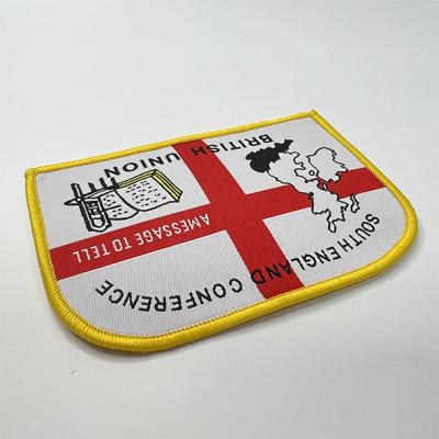 Cina Ferro su ordinazione della mappa del cartone dell'OEM su forma su ordinazione tessuta del confine fatto a mano delle toppe per abbigliamento in vendita