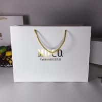 China Ribbon Handle Apparel Paper Bag for sale