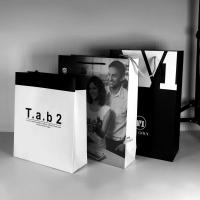 China Ribbon Handle Apparel Paper Bag for sale