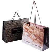 China Ribbon Handle Apparel Paper Bag for sale