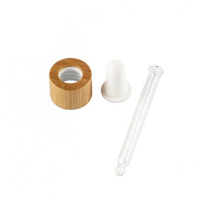 China Os cosméticos da garrafa de óleo da essência engarrafam as partes superiores de bambu 0.25ml 0.5ml do conta-gotas à venda