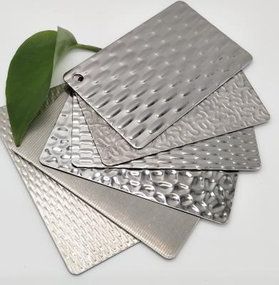 Cina 0.3mm lamiere in acciaio inossidabile in rilievo lastre decorative personalizzate rivestimento murale fabbricazione metallica in vendita
