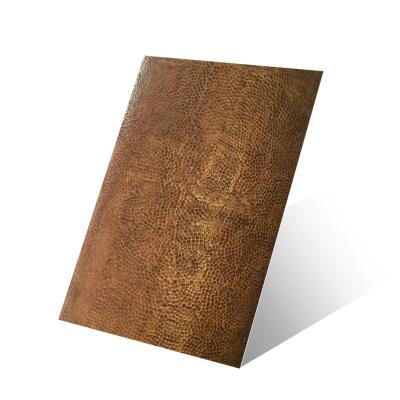China met laser gesneden decoratieve textuurplaat met gehamerd roestvrijstalen cilinder/pilaar Te koop