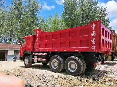 China Red Euro 2 Used Howo Trucks , HW76 Cab Second Hand Dumper Truck for sale