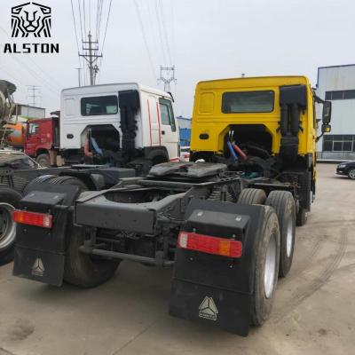 China Unidade diesel do trator do poder 6x4, caminhão do trator da mão de Howo segundo à venda