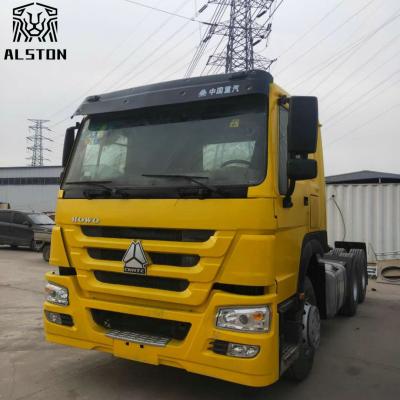 China Unidade diesel do trator do poder 6x4, caminhão do trator da mão de Howo segundo à venda