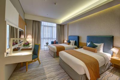 China Prey Veng Province furniture supplier for Hotel room furniture hotel bed with wood tables and hotel sofa set for sale