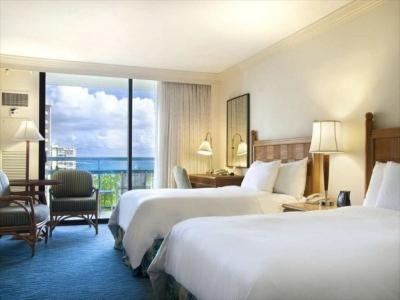China Sakiao interior designer for Hotel guestroom furniture by wood headboard beds with rattan armchairs and TV stand cabinet for sale