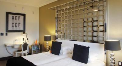 China Timor-Leste Light luxury hotel furniture of Stainless steel headboard bed with leather pad and Leisure chairs with table for sale