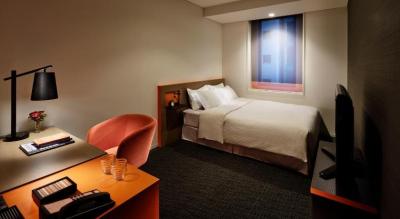 China Darwin hotel style apartment samll space furniture by single bed with dining table and leather sofa chair for sale