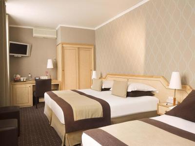 China Abuja luxury hotel innerr furniture supplier of bedroom set with in wall wardrobe cabinet and desk table fabric chair for sale