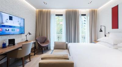 China Zambia hotel furniture factory from China by fabric upholstered bed with wood night table and wardrobe cabinet for sale