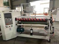 China 1000mm Non Adhesive Automatic Rewinding Machine with Servo Motor and PLC Tension Control for sale