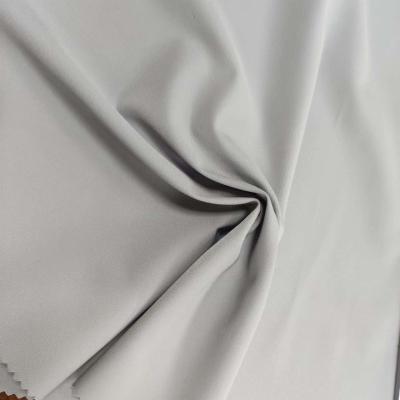중국 짜여진 90% 폴리에스테르 10% 스판덱스 직물 작게 찢어지는 것을 막도록 가공된 회색 씨실 155G 운동복 판매용