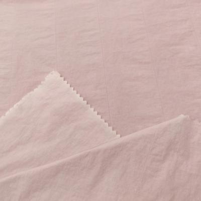 China 87% Nylon 13% Spandex Pink Outdoor Fabric For Down Jacket 119gsm for sale