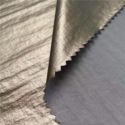China Heavy Duty Ripstop Winter Jacket Fabric 90GSM 70D 70D 210T Pearly Coated for sale