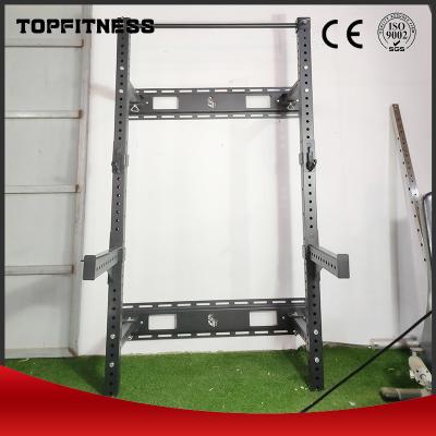 Cina 80 kg Peso netto Fonte di alimentazione manuale montata a parete Pieghevole Squat Strength Rack per la casa in vendita