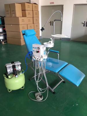 China Portable folding patient dental chair sale, silla dental plegable with dental led lamp spittoon for sale