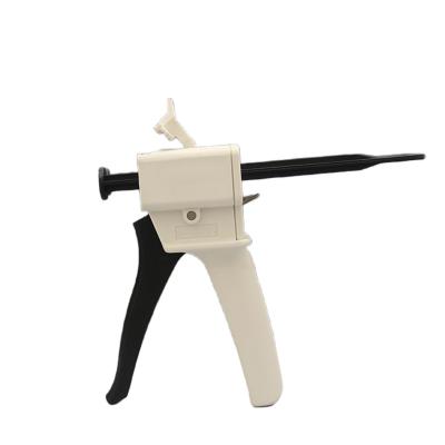 China Light Body Dipensing Impression Meterial Gun Dental for sale
