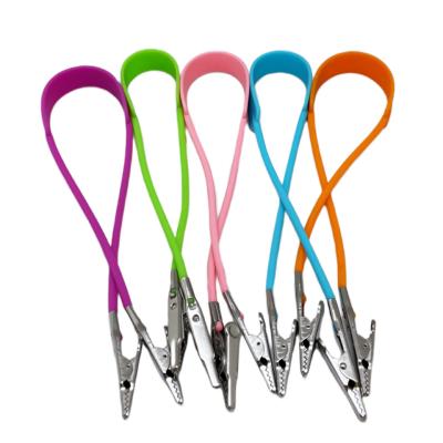 China Silicon Dental Reusable Silicone Chain Bibs Clips Napkin Holder for sale