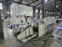 China Computerized Precision Automatic Nova Paper Towel Maxi Roll Band Saw Cutting Machine for sale