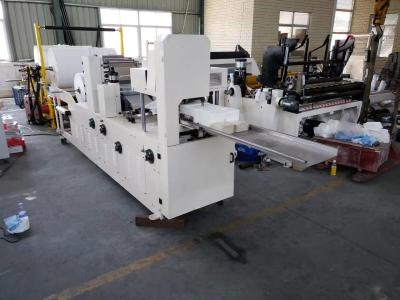 Cina Piegare di goffratura stampando la carta velina del tovagliolo che fa la taglierina della sega a nastro della macchina in vendita