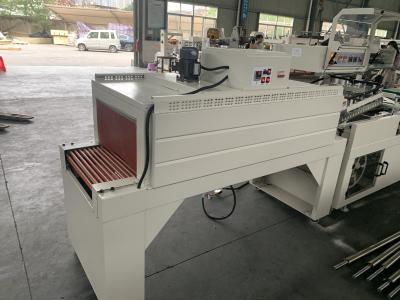 中国 弛み250mmの高さのペーパー シーリング機械、別のモーター ペーパー収縮の覆い機械を防ぎなさい 販売のため