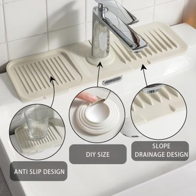 Cina Manicotto del rubinetto in silicone Tavolo Mat utensili da cucina lavanderia del lavandino Sapone Spugna supporto accessori Matta per il deposito di piccoli attrezzi in vendita