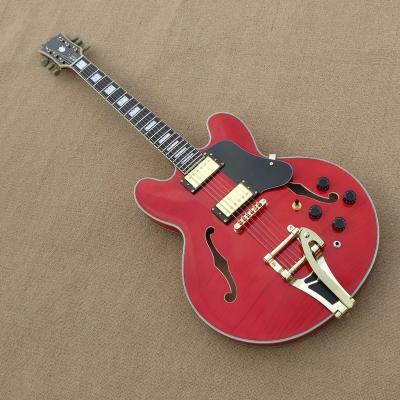 China Hollow body electric guitar quilt flame on body top and back ,Natural wood color,gold hardware for sale