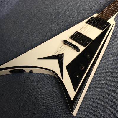 China High-quality custom V style electric guitar rosewood fingerboard yellow circle black edge for sale