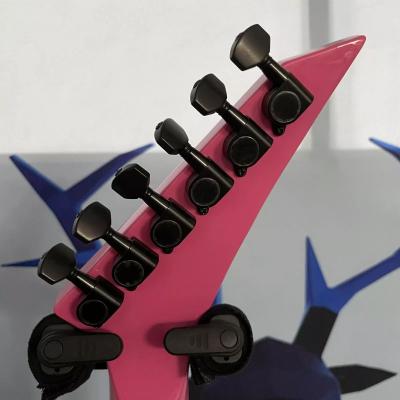 中国 左手ピンクスワローテイル V 固体 電気ギター オープンピック 22 フレット 販売のため