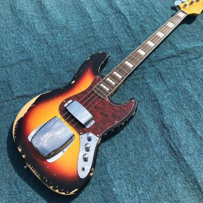 China Heavy Relic Jazz Bass Electric Guitar Sunburst Color Alder Body 100% Handmade Nitrolacquer Finish Aged Hardware for sale