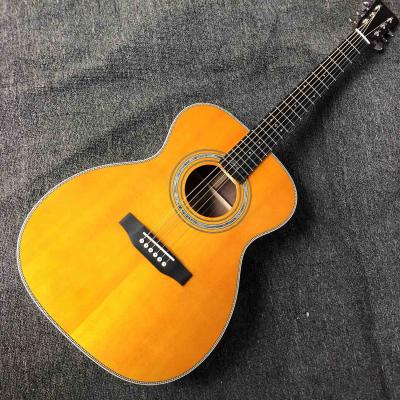 China Custom Solid Spruce Top Wood OM JM 14 Frets Acoustic Guitar Fishbone Binding for sale
