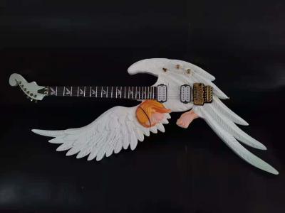 China Custom 2021 new design irregular hand carved electric guitar accept OEM for sale