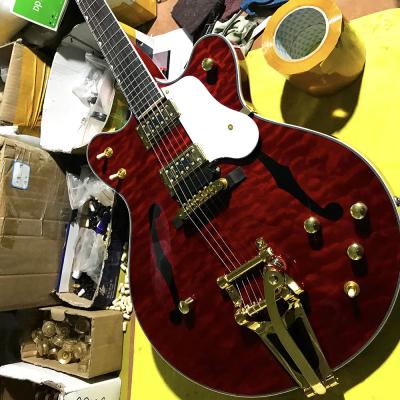 China Custom Double F Hollow Body Jazz Eelectric Guitar with Golden Tremolo Quilted Flamed Maple Top Gret Style Guitar for sale