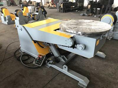 China 5T Hydraulic Elevating Welding Rotating Display Table With Remote Hand Control for sale