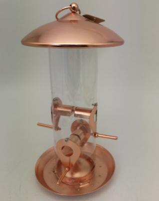 China 4 feed port Shining hanging copper plated bird feeders clear pc tube for sale