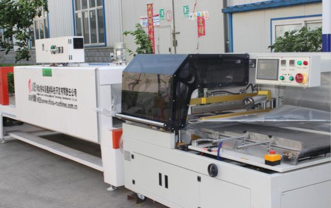 Gypsum Board Shrink Wrap Tunnel Packaging Machine in operation